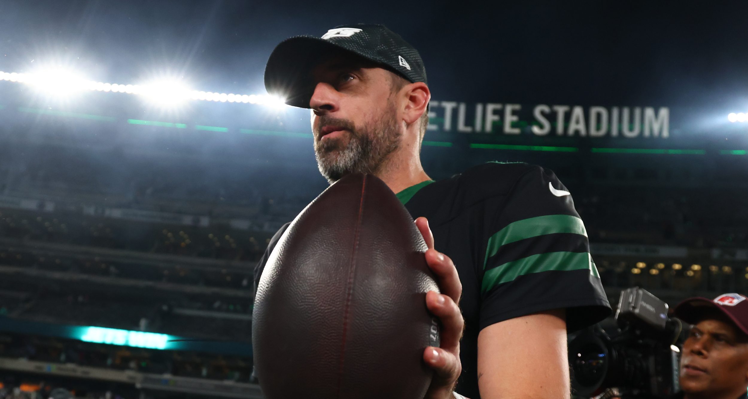 Oct 31, 2024; East Rutherford, New Jersey, USA; New York Jets quarterback Aaron Rodgers (8) walks off the field after the Jets win over the Houston Texans at MetLife Stadium.